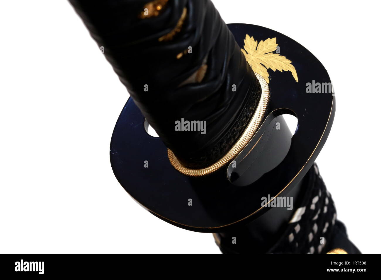 Tsuba : hand guard of Japanese sword with white background Stock Photo ...