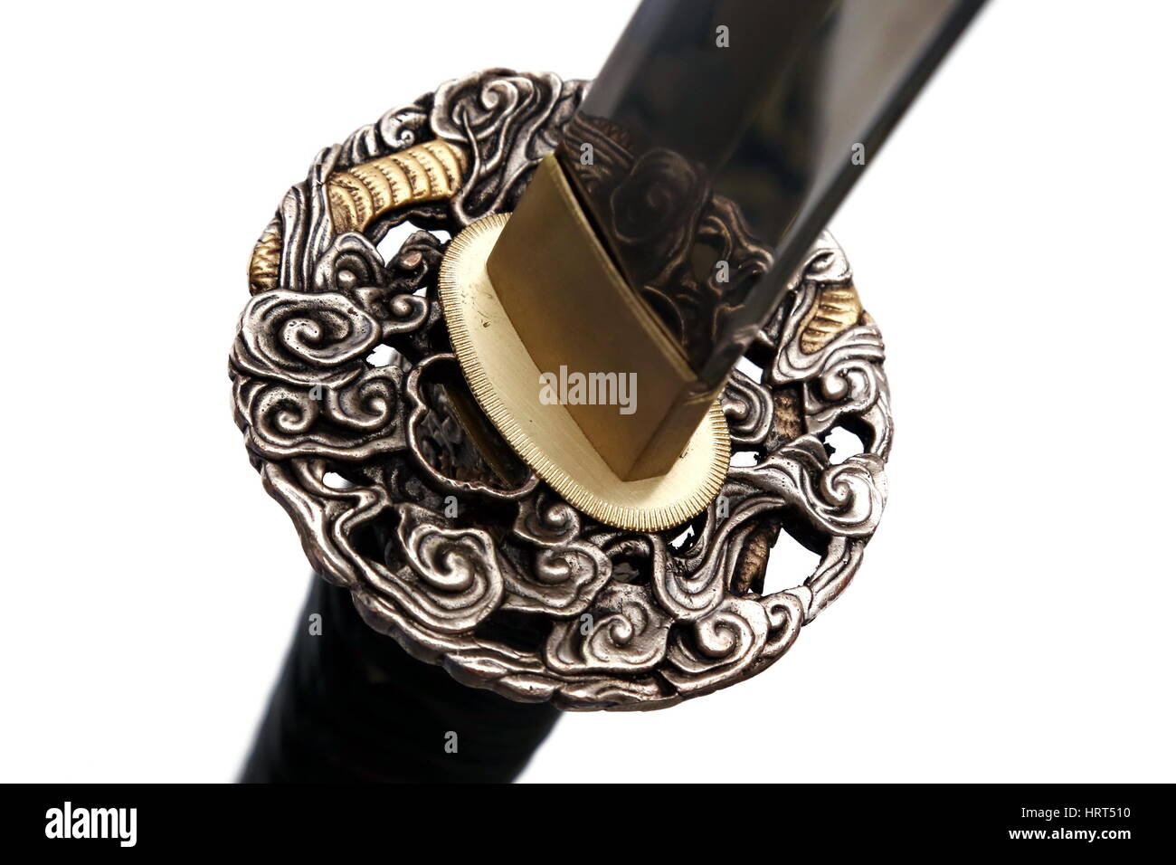 Tsuba : hand guard of Japanese sword with white background Stock Photo ...