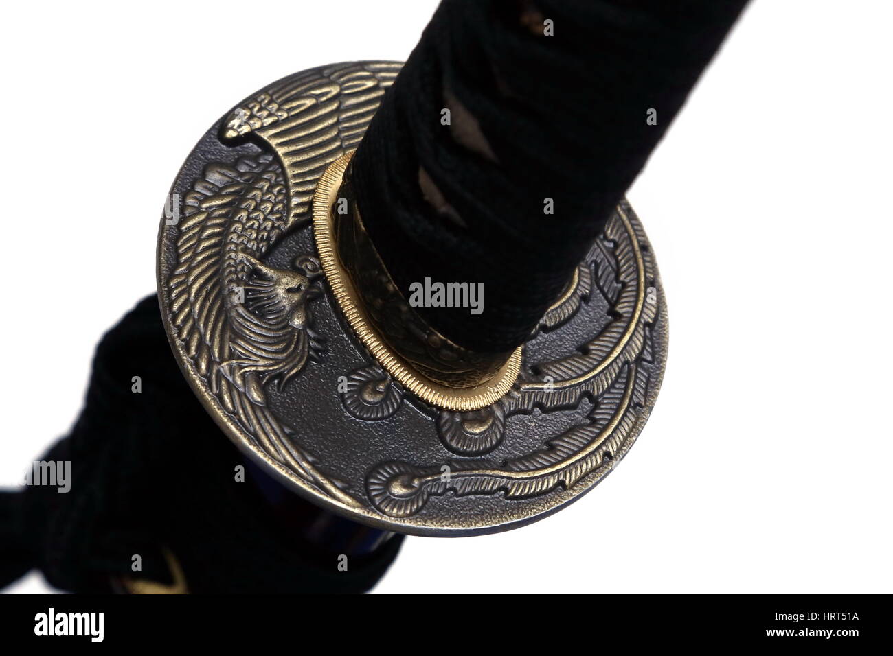 Tsuba : hand guard of Japanese sword with white background Stock Photo ...