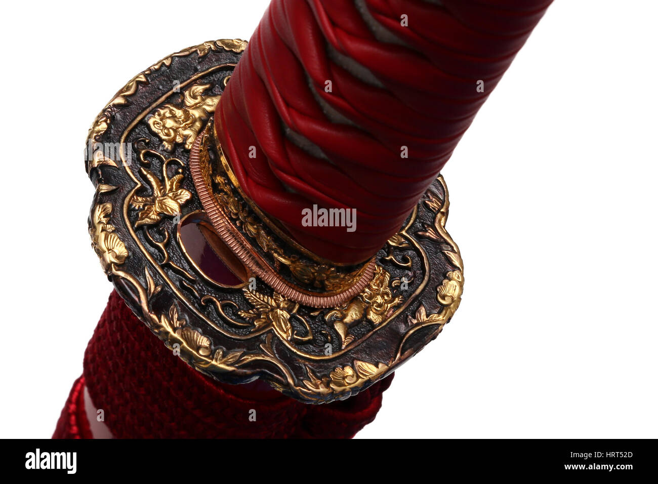 Tsuba : hand guard of Japanese sword with white background Stock Photo ...