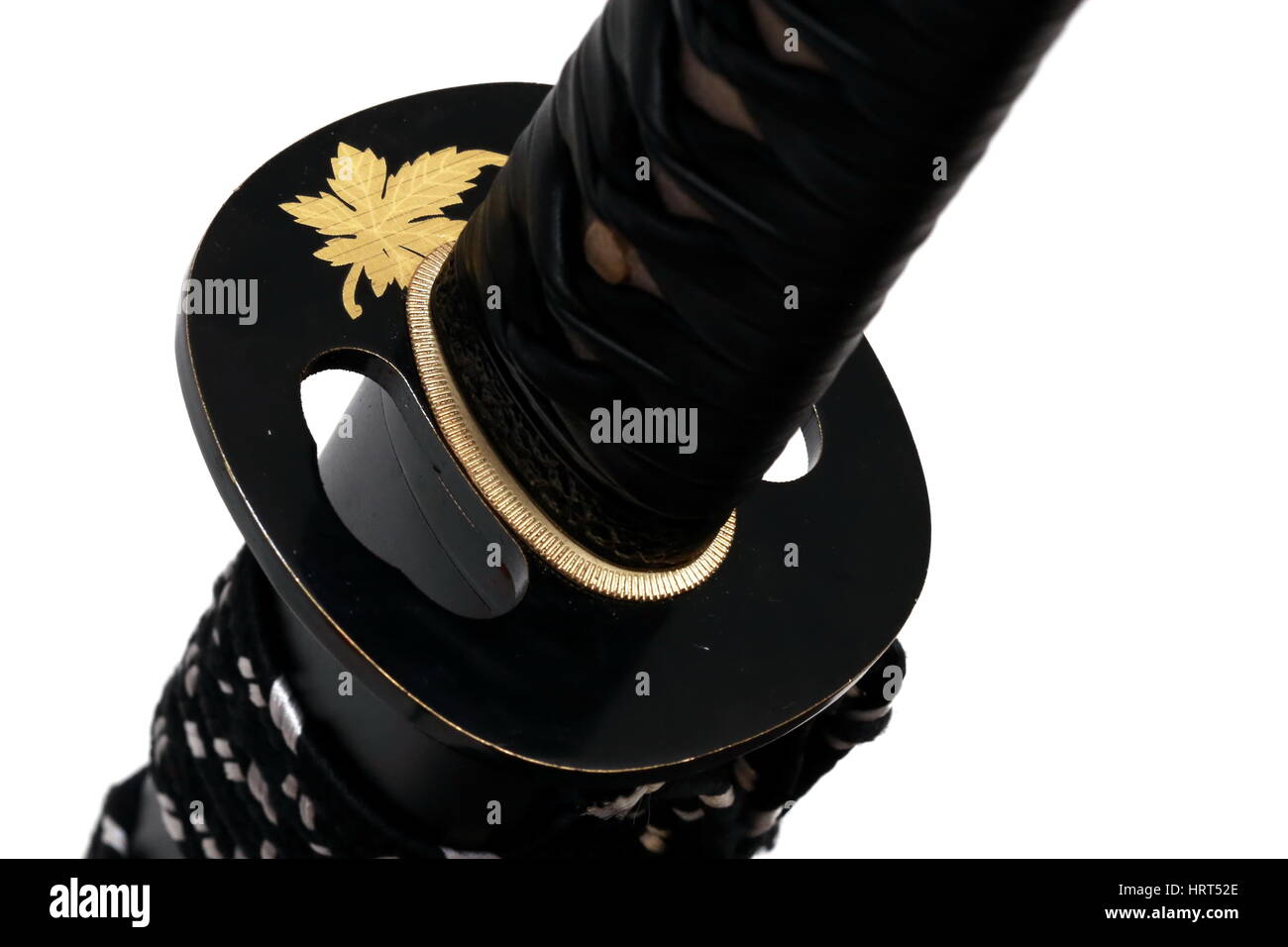 Tsuba : hand guard of Japanese sword with white background Stock Photo ...