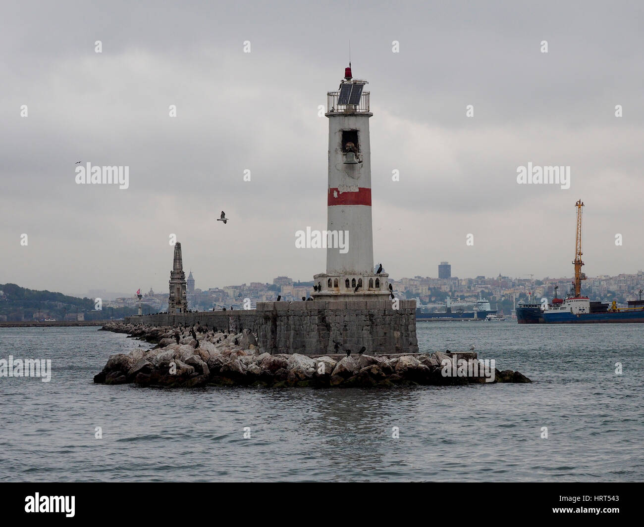 VIEW OF LIGHTHOUSE AT HARBOUR ENTRANCE TO FERRY PORT ISTANBUL TAKEN ...