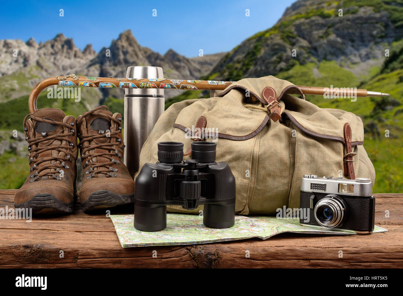 Hiking equipment mountains in the background Stock Photo - Alamy