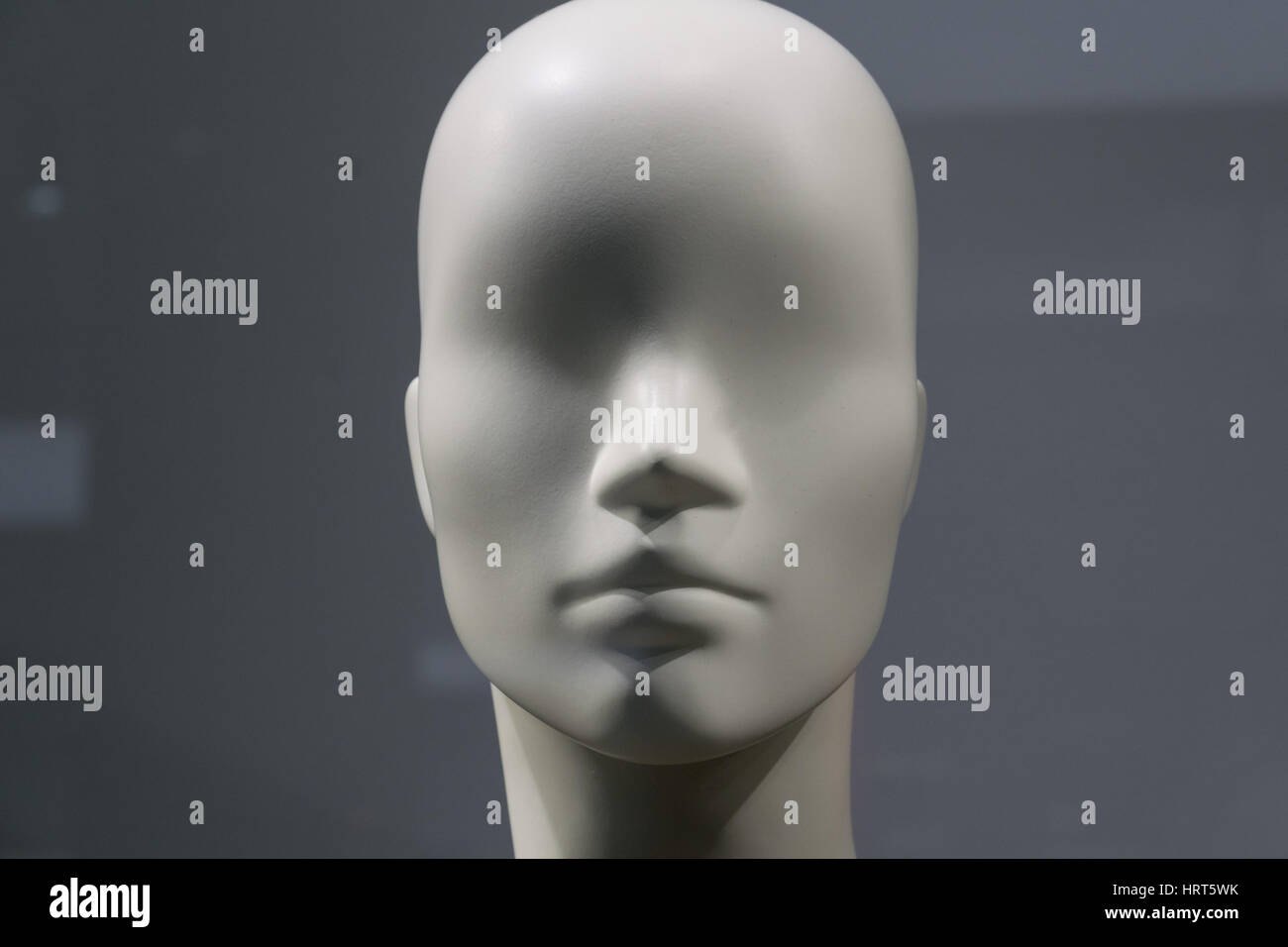 Smooth grey Mannequins in a shop window Stock Photo - Alamy