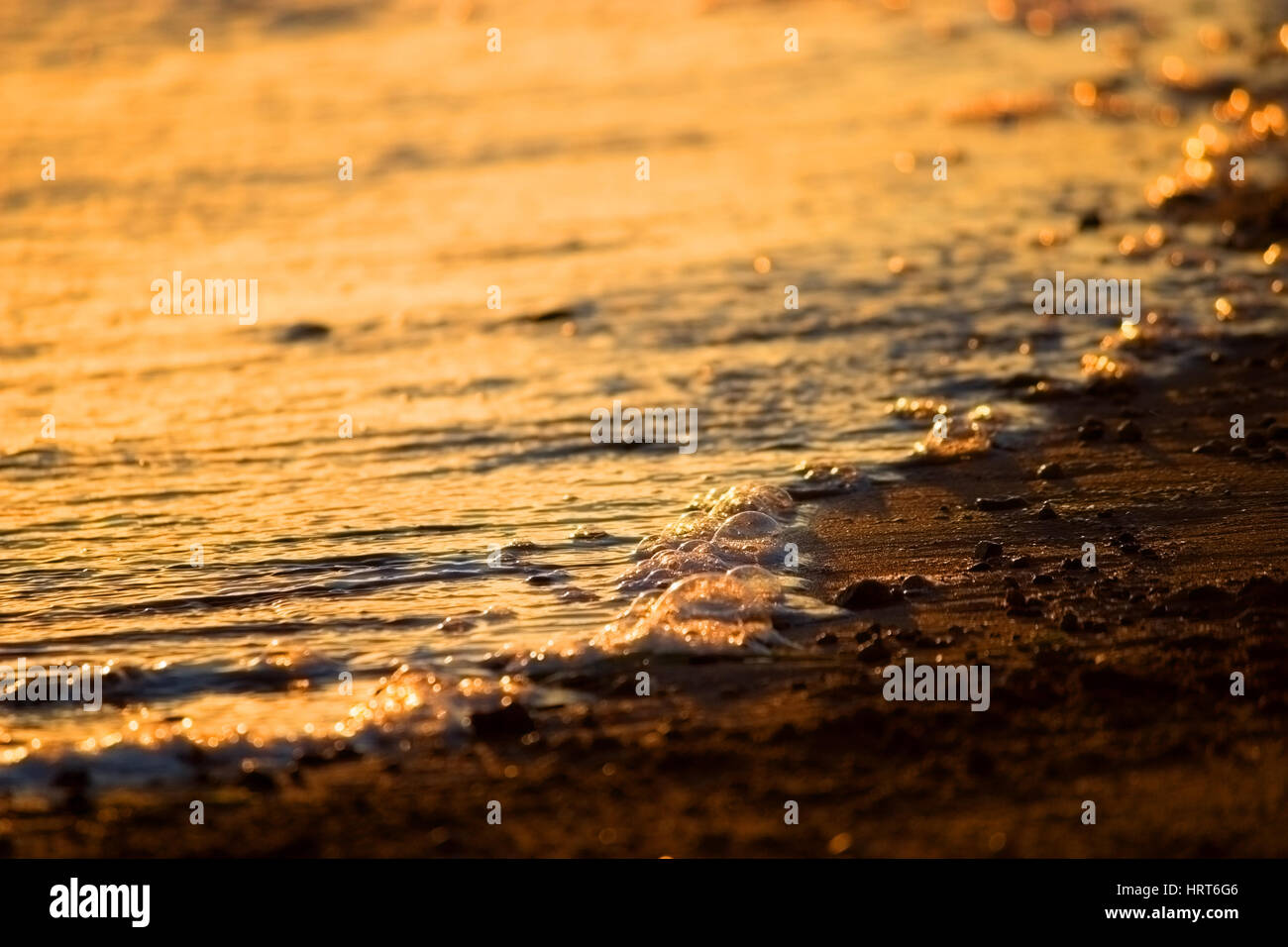 sun reflection on ocean waves. close up background Stock Photo - Alamy