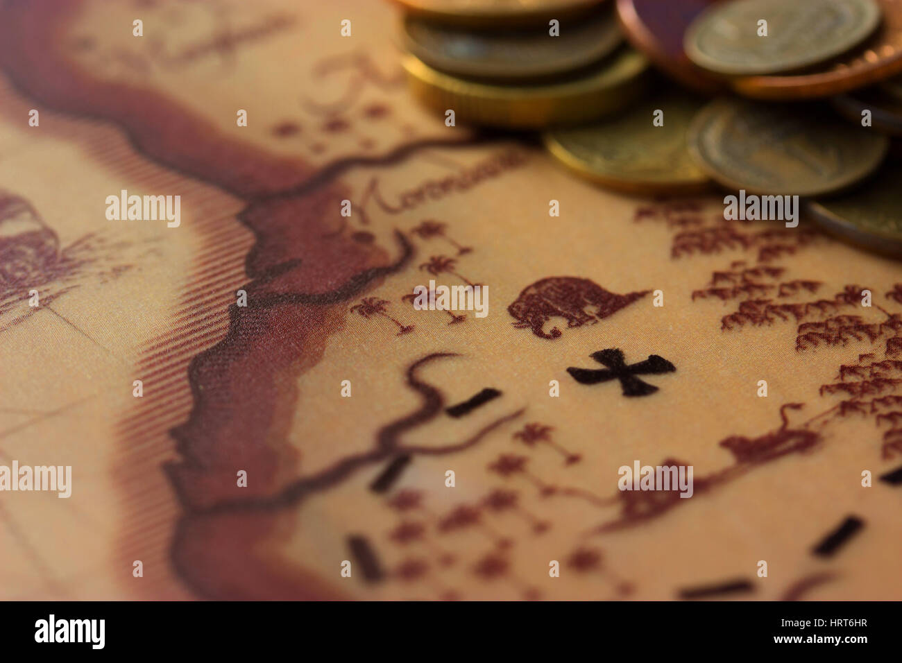 hidden treasure map and coins. pirate lifestyle concept Stock Photo - Alamy