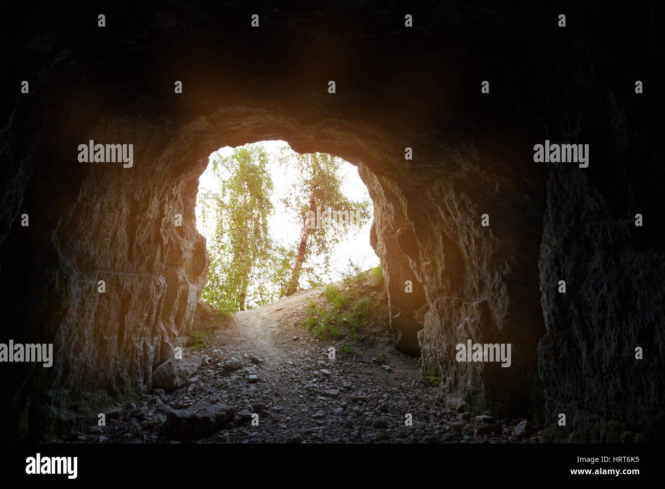 entrance to the cave. view inside the cave Stock Photo - Alamy