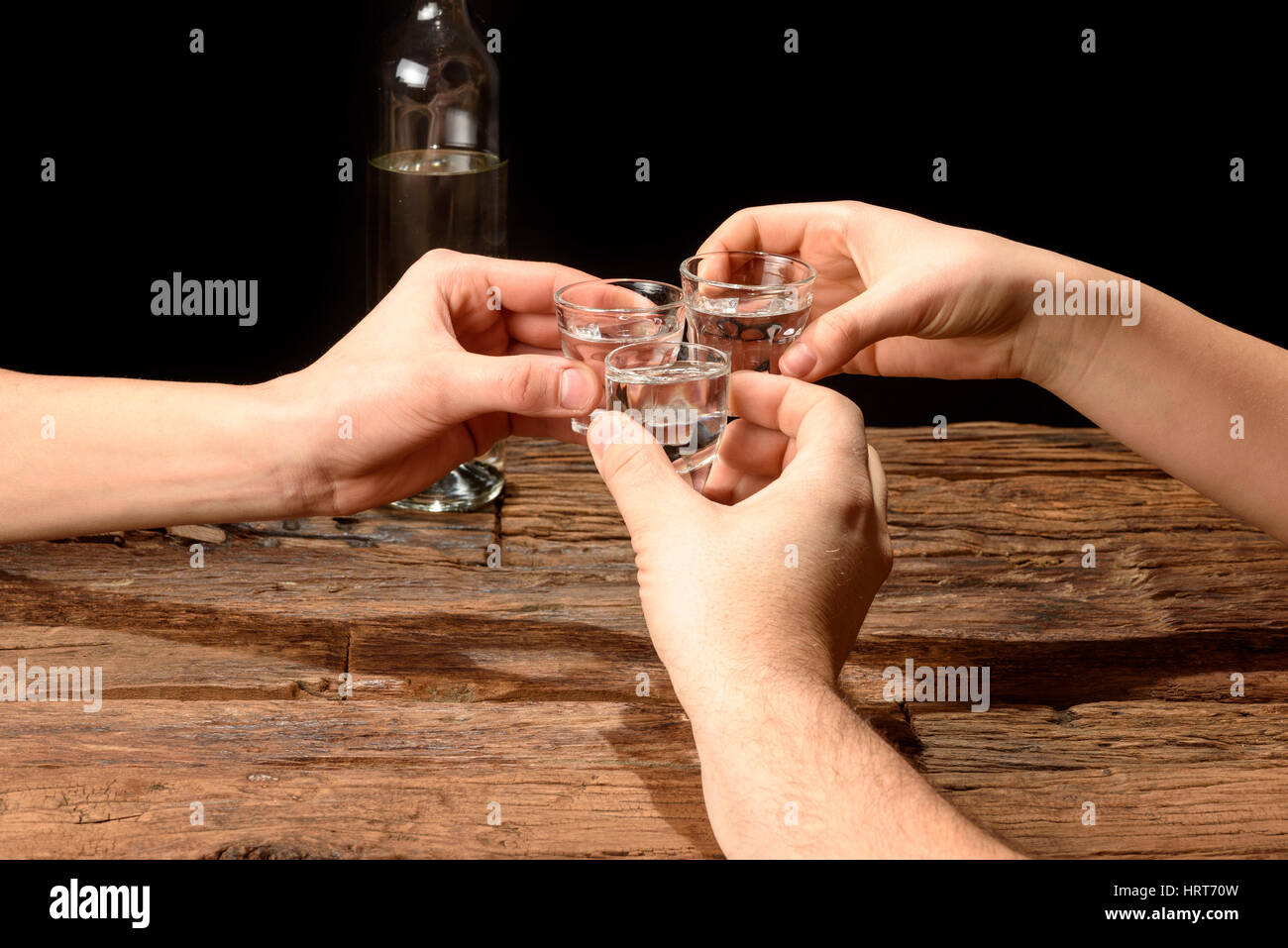 Hands toasting shots High Resolution Stock Photography and Images - Alamy