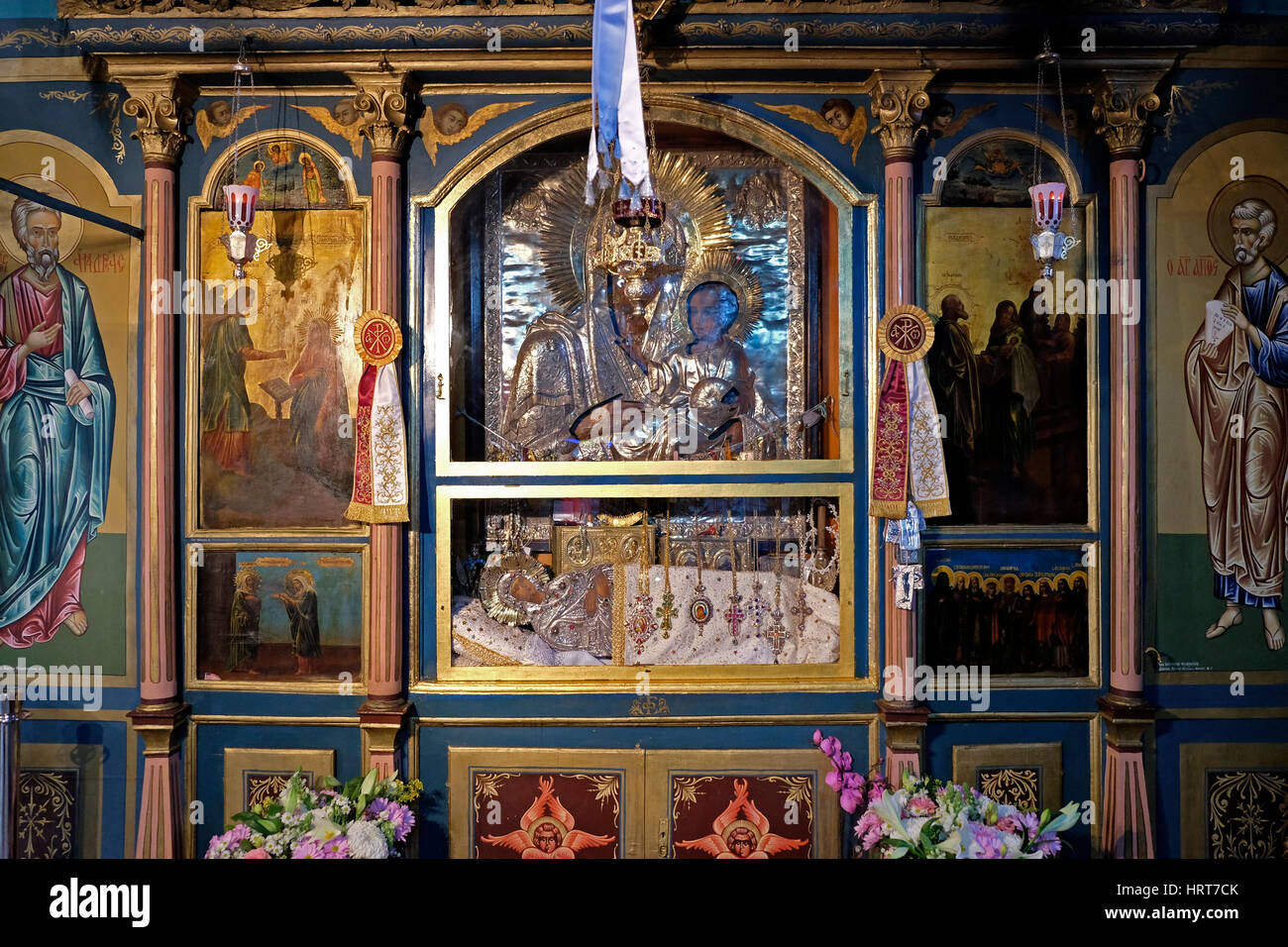 The iconostasis decorated with icons and religious paintings inside the church of the Greek ...