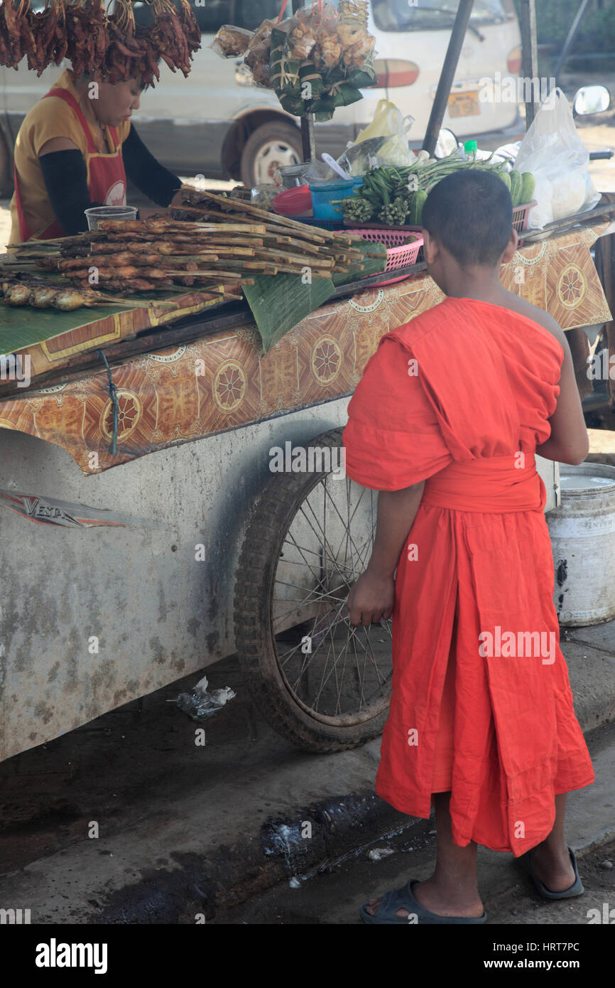 Laos, Vientiane, street food stall, young buddhist monk Stock Photo - Alamy