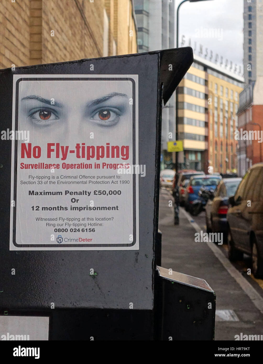 Sign with penalties for fly-tipping in street in Islington, London ...
