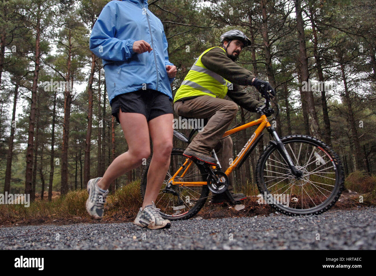 Running versus cycling hi-res stock photography and images - Alamy