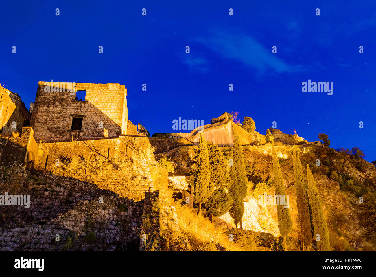 San Giovanni castle ruins in Kotor at night Stock Photo - Alamy