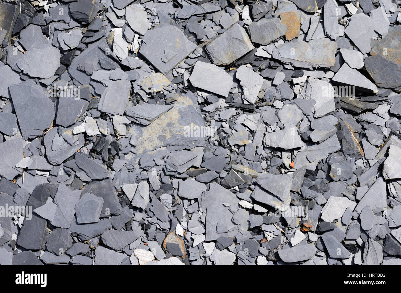 Broken slate on the ground Stock Photo - Alamy