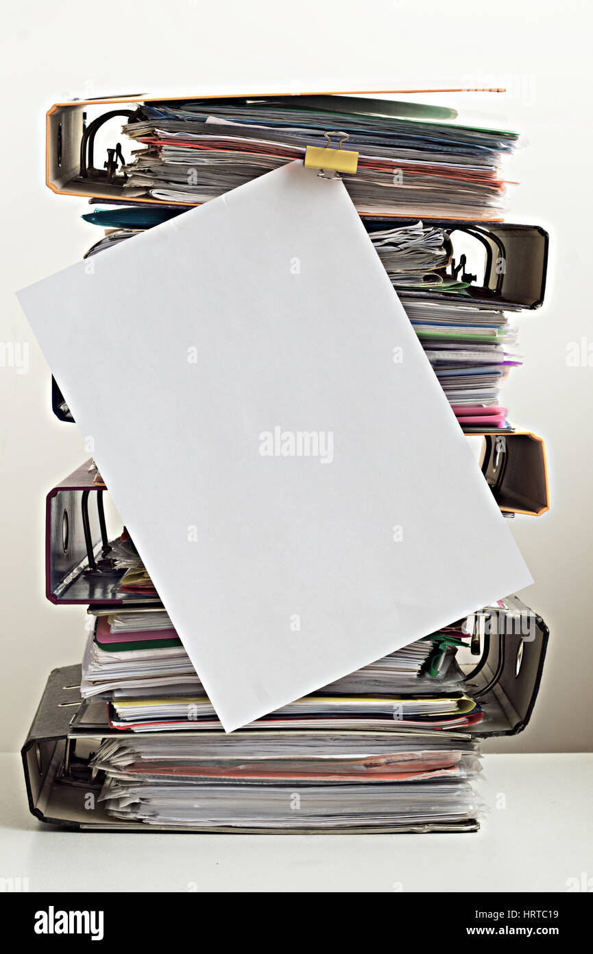 Folders stacked on table hi-res stock photography and images - Alamy