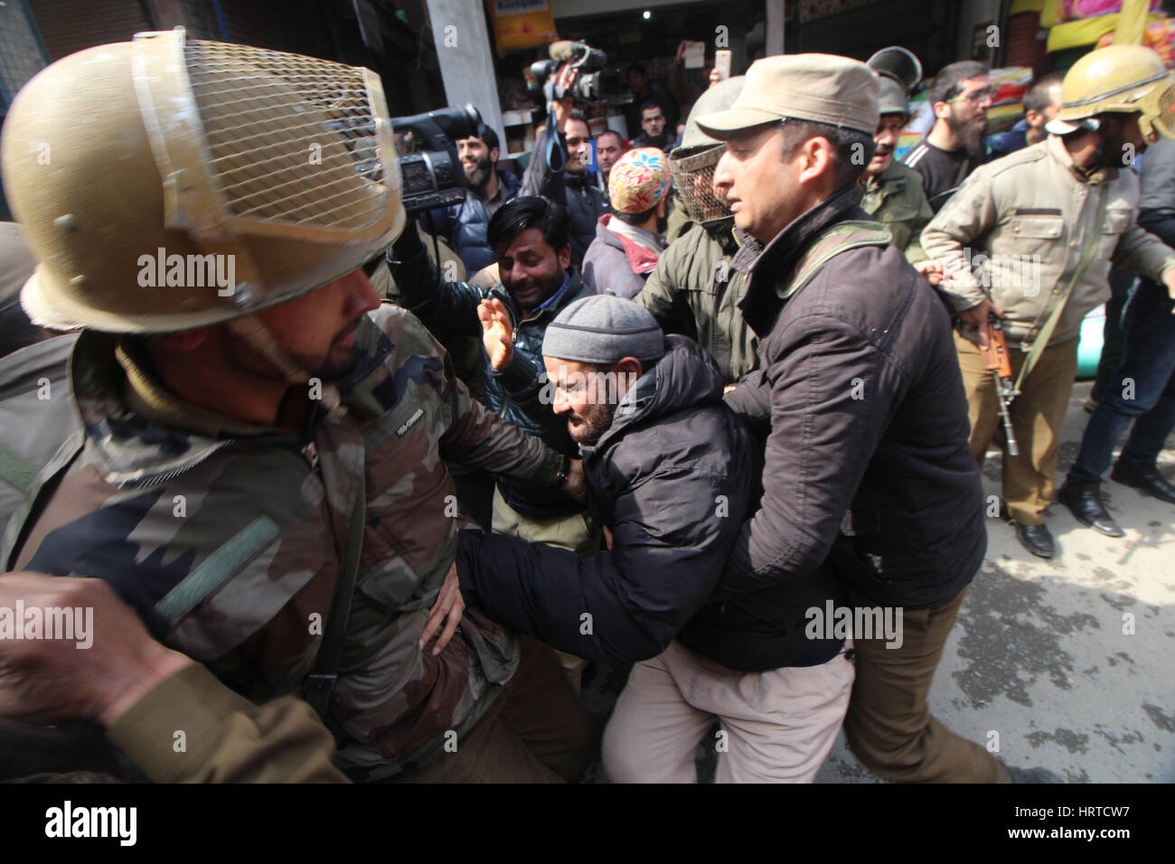 Police detaining hi-res stock photography and images - Alamy