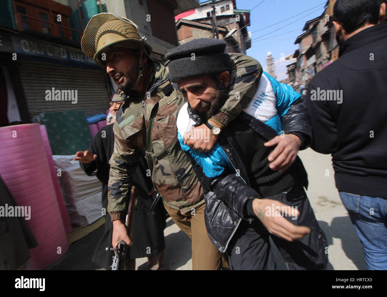 Srinagar, Kashmir. 03rd Mar, 2017. Police detaining the Jammu and ...