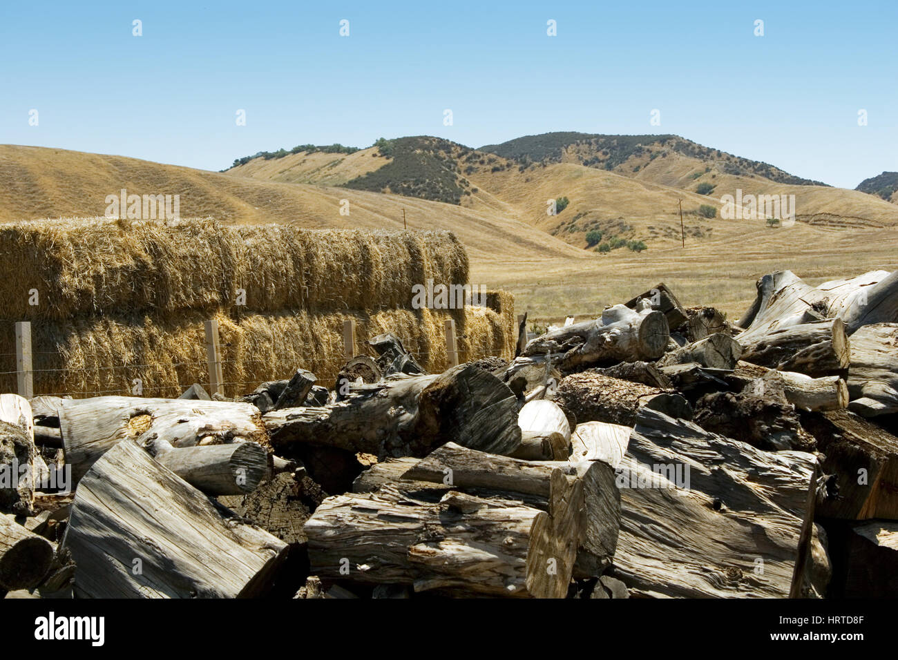 Bale of straw and wood with background Stock Photo - Alamy
