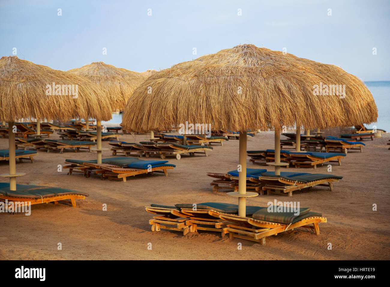 Beautiful empty resort beach at sunset time. Horizontal color image ...