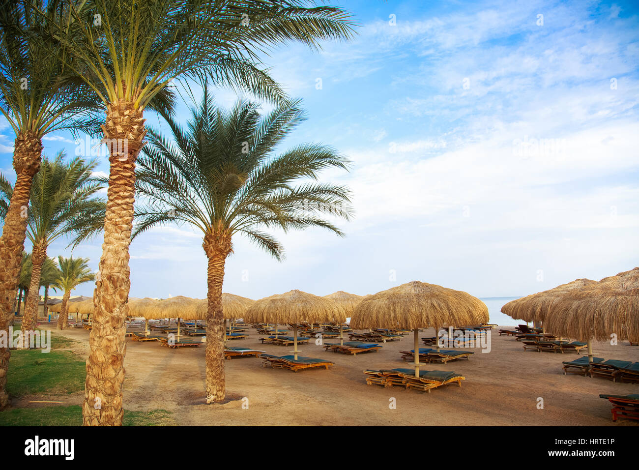 Beautiful empty resort beach at sunset time. Horizontal color image ...