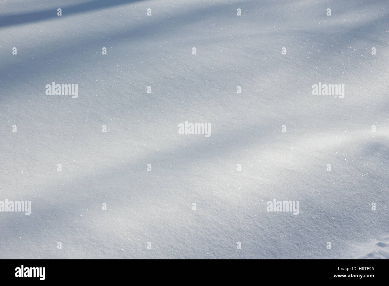 Fresh snow texture with natural shadows on winter ground. Horizontal ...