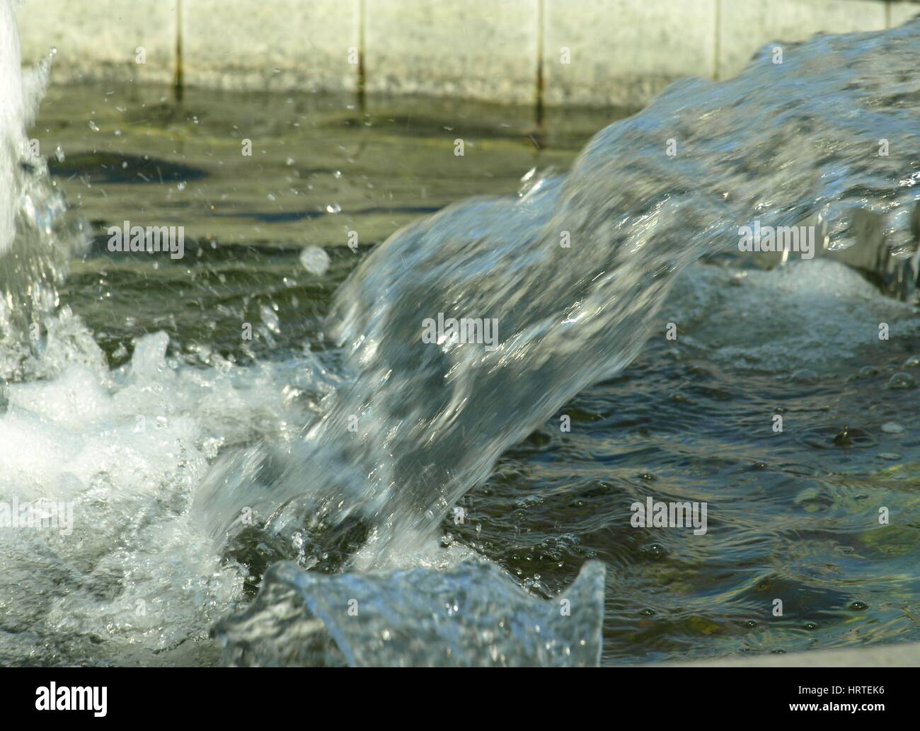 Flowing water in fountain Stock Photo - Alamy