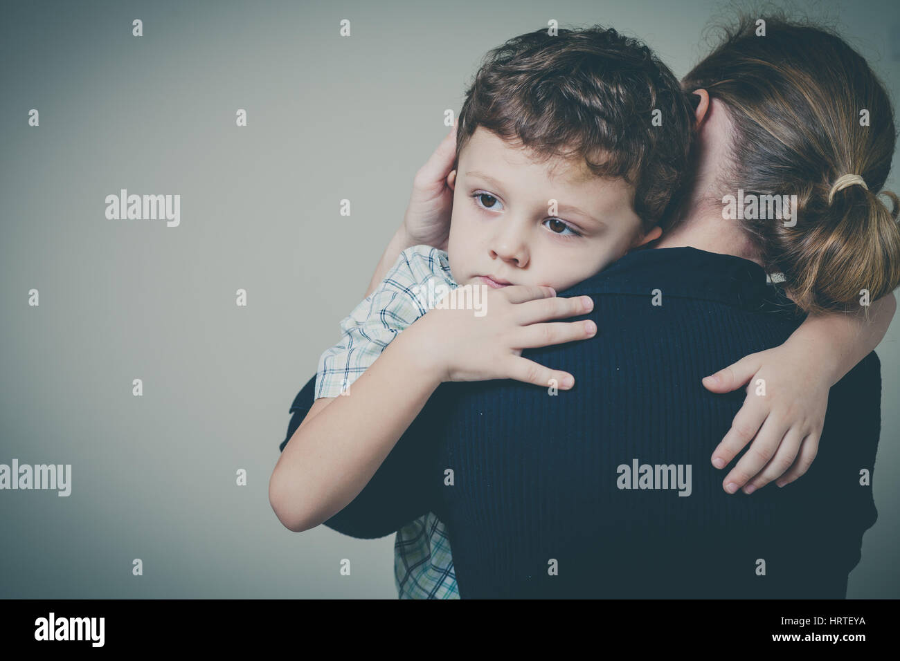 Mother Hugging Son Sad High Resolution Stock Photography and Images - Alamy