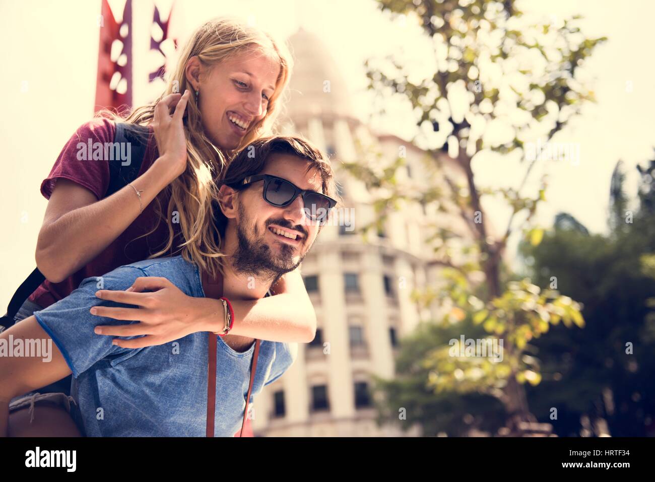 Sweet couple piggyback ride togetherness Stock Photo - Alamy