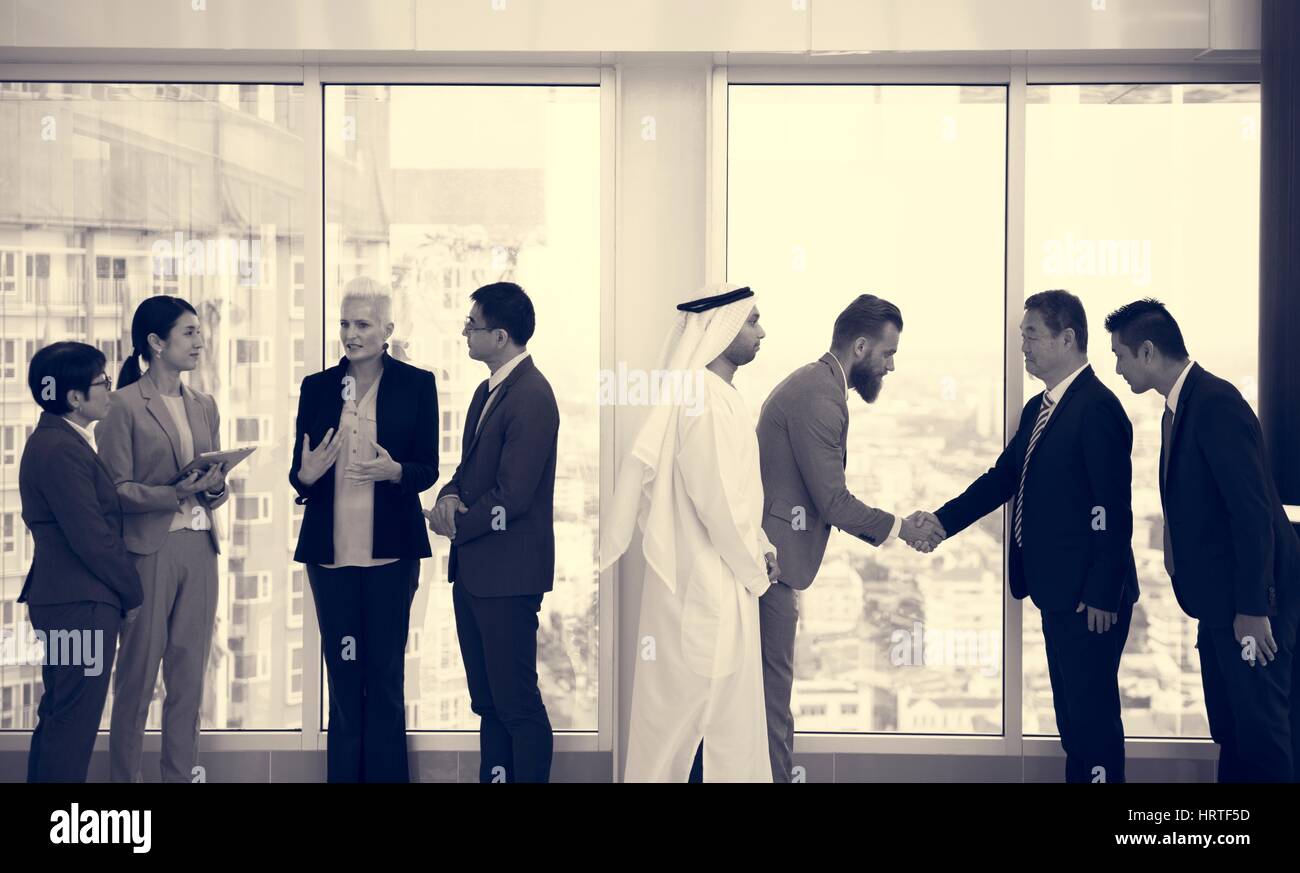 Business Partners Introductionary Handshake Bow Stock Photo - Alamy