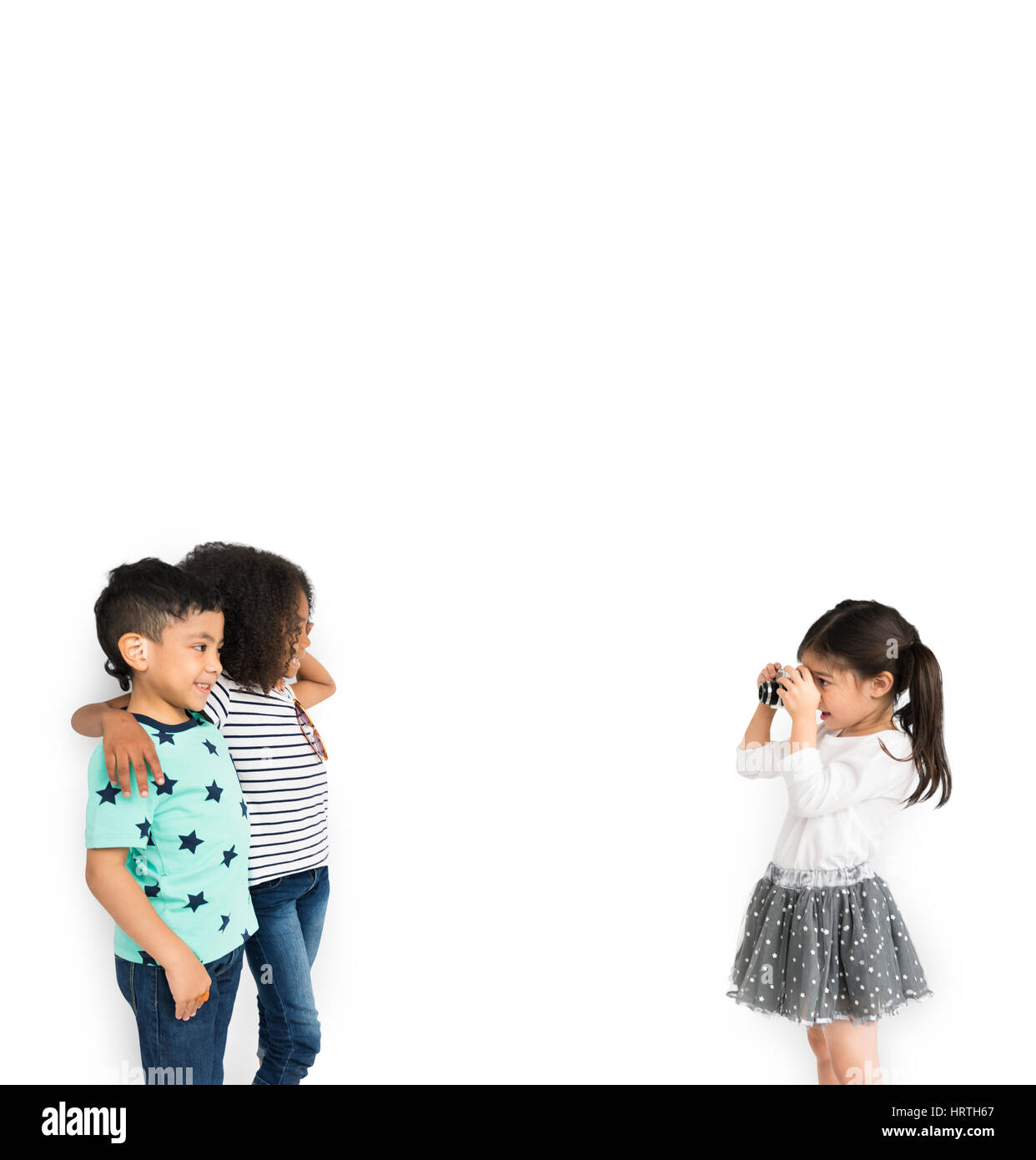 Group children smiling posing Cut Out Stock Images & Pictures - Alamy