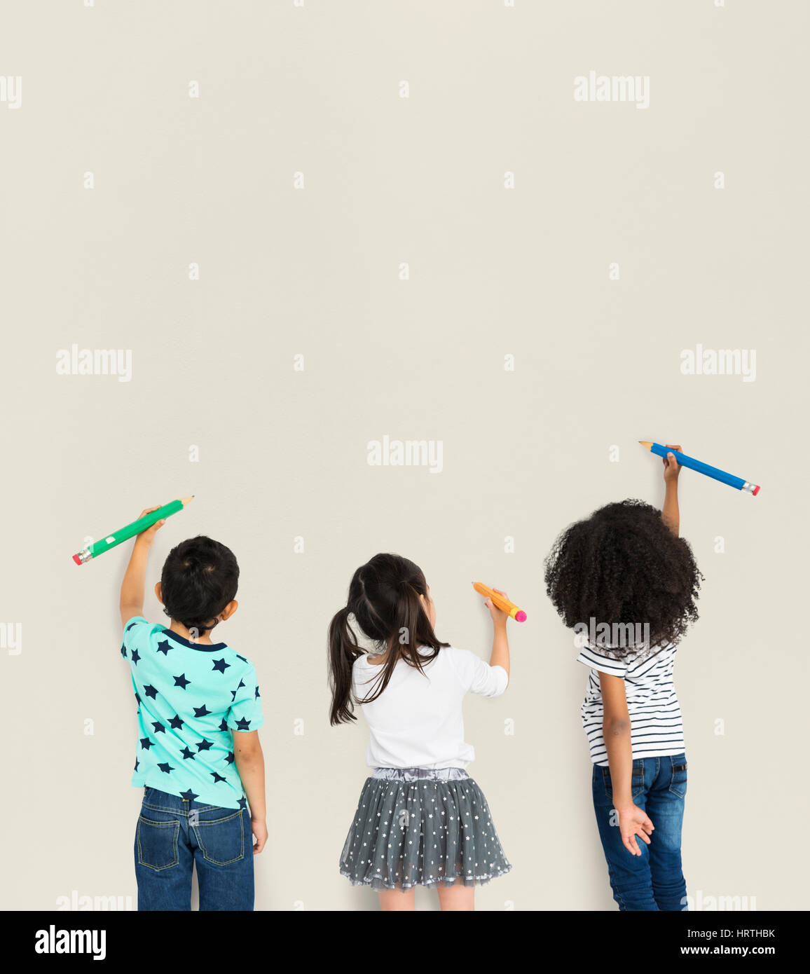 Little Children Drawing Together Creative Stock Photo - Alamy