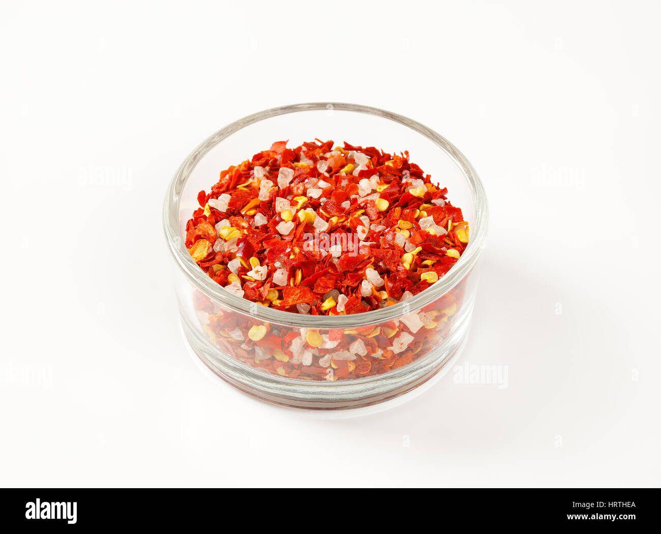 bowl of dried pepper and salt on white background Stock Photo - Alamy