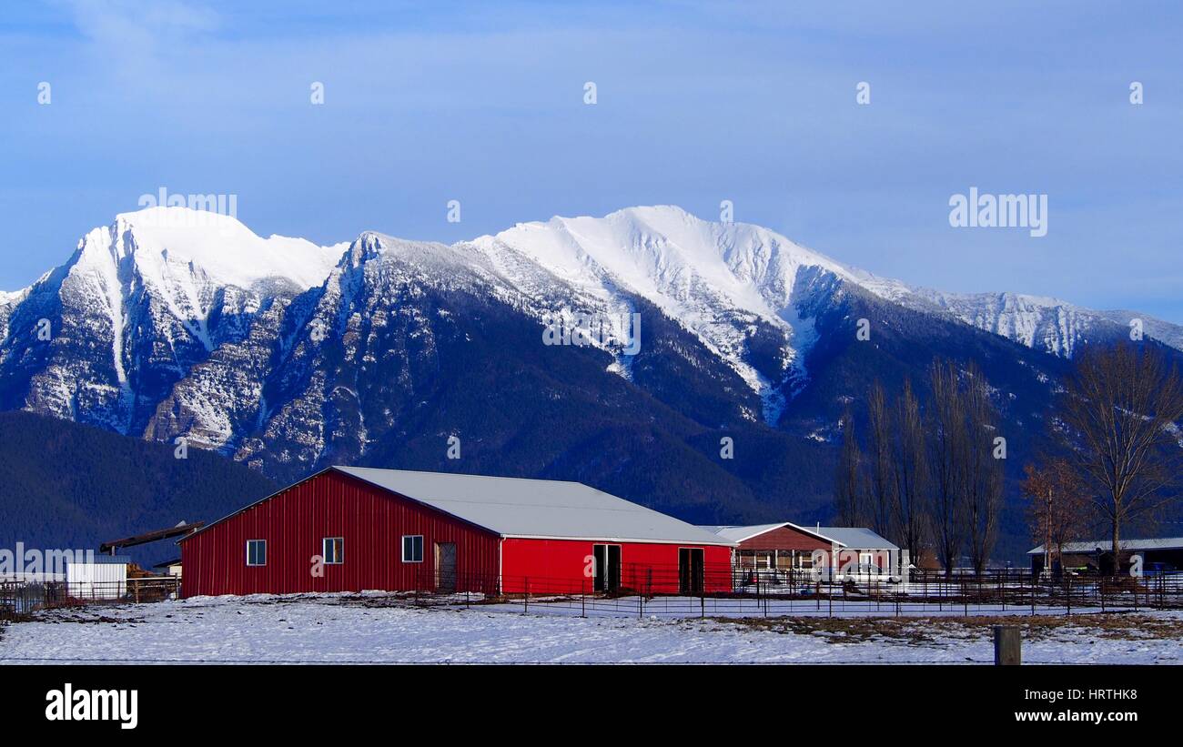 Red Barn in Big Sky Country Stock Photo - Alamy