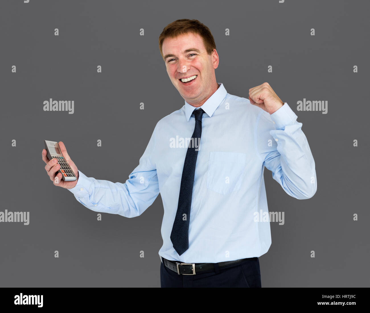 Caucasian Business Man Calculator Smiling Stock Photo - Alamy