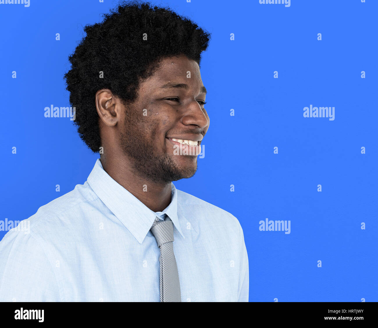 African Descent Man Smiling Side Concept Stock Photo - Alamy