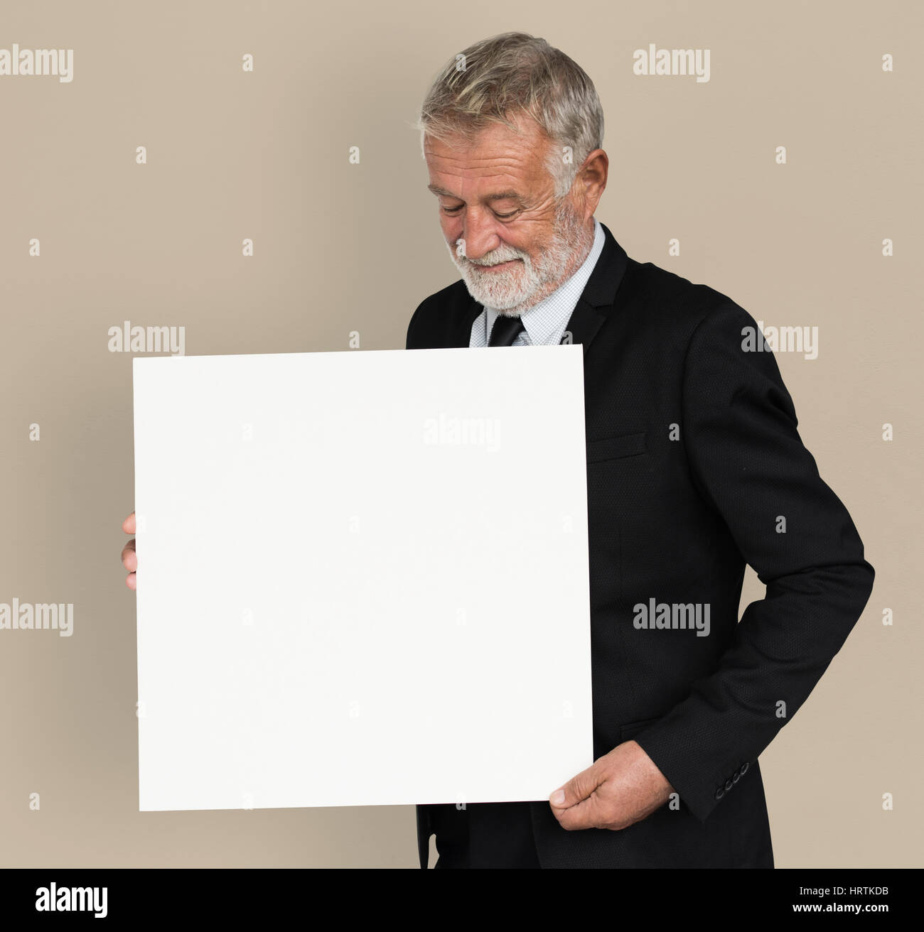 Caucasian Man Showing Presenting Document Stock Photo - Alamy