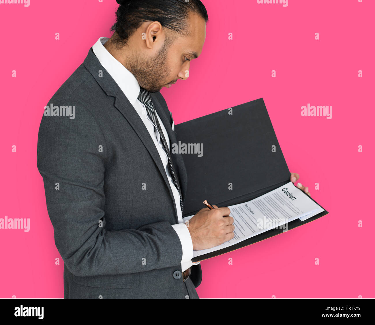 Asian man signing contract hi-res stock photography and images - Alamy