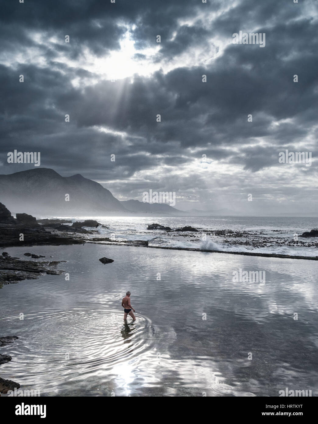 Lone figure in pool hi-res stock photography and images - Alamy