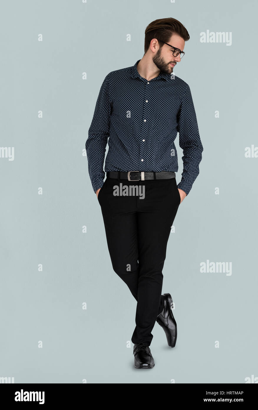 Man standing cross legs hi-res stock photography and images - Alamy