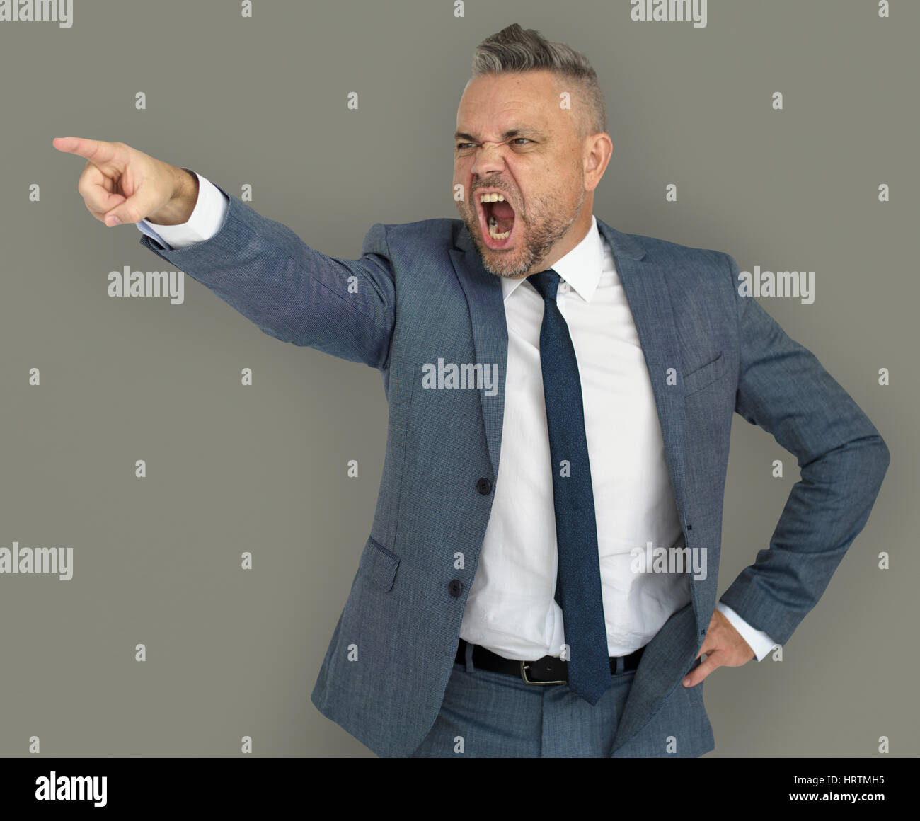 Caucasian Business Man Pointing Angry Stock Photo - Alamy