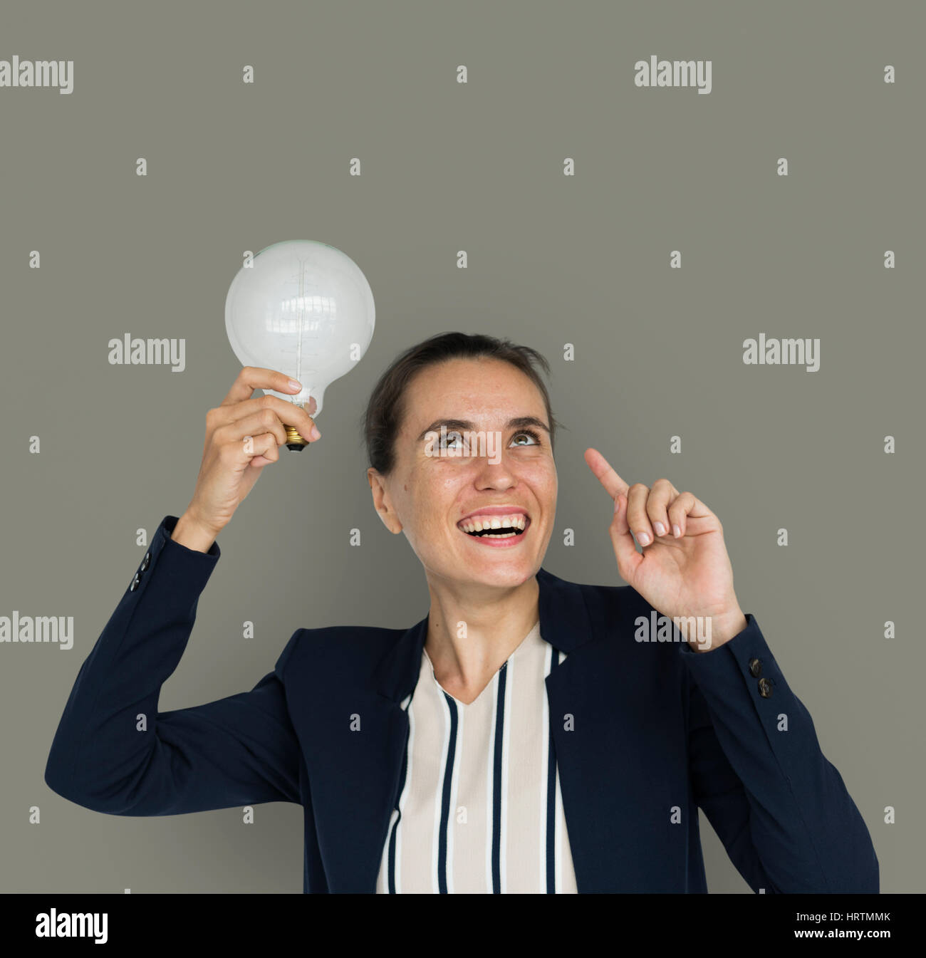 Caucasian Business Woman Light bulb Stock Photo - Alamy
