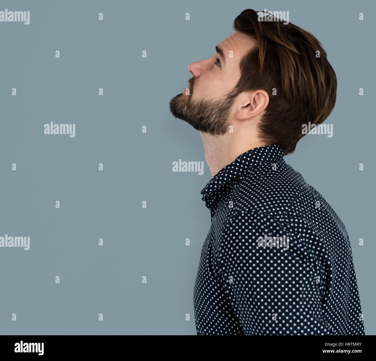 Man Curious Thinking Look up SIde View Portrait Stock Photo - Alamy