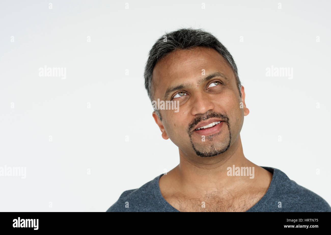 Indian guy smiling cheerful studio portrait Stock Photo - Alamy