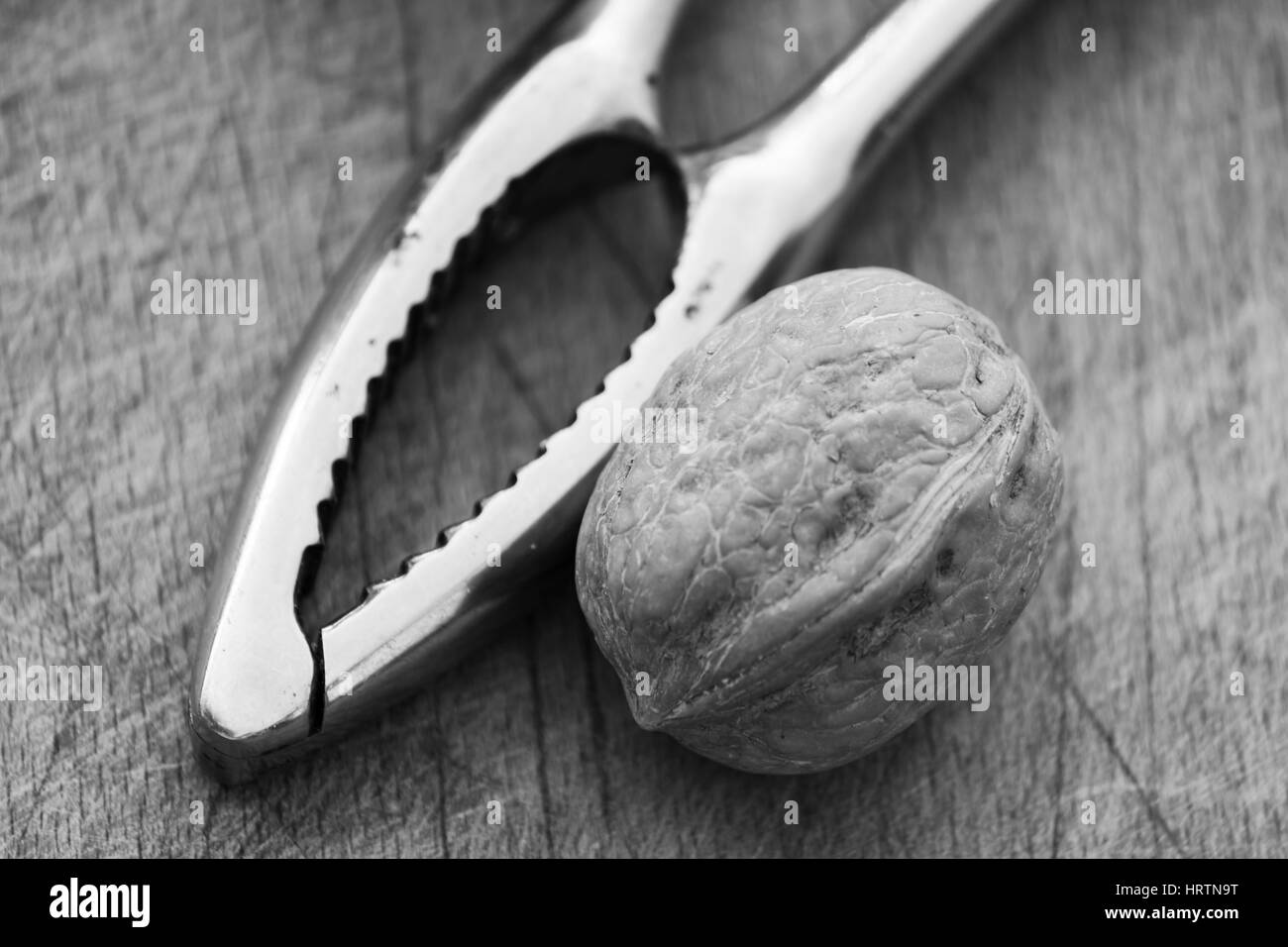 Walnut and nutcracker Stock Photo - Alamy