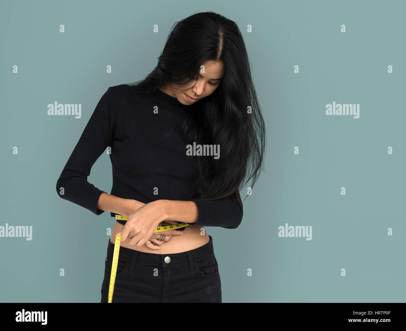 Young Women With Measurement Tape Stock Photo - Alamy