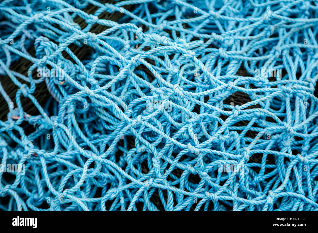 Blue fishing net hi-res stock photography and images - Alamy