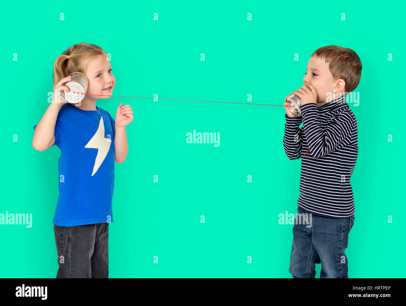 Little Kids Using String Phone Adorable Cute Stock Photo - Alamy