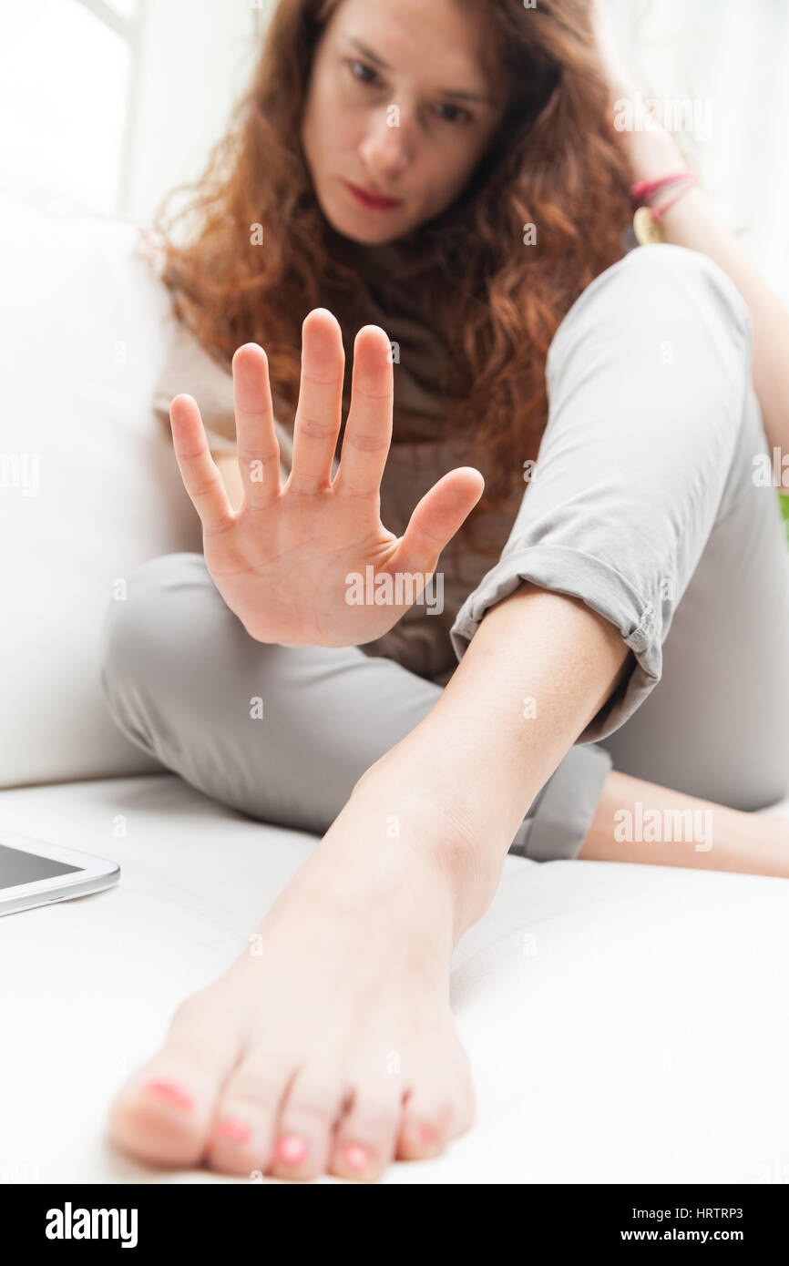 young slim attractive woman checking her nails, she's going to change her nail art Stock Photo ...