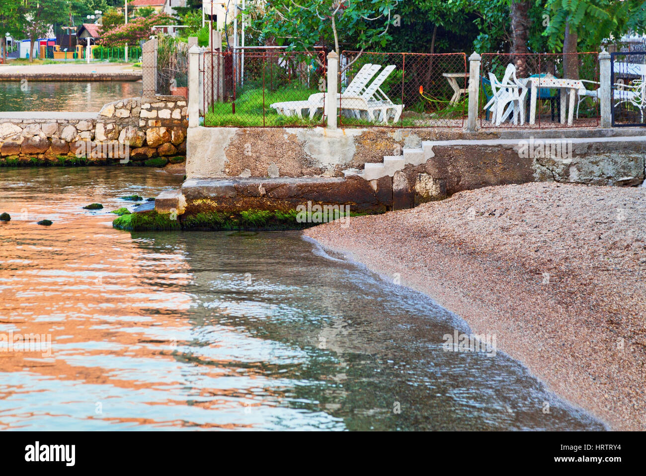 Morning small pebble beach. Montenegro Stock Photo - Alamy