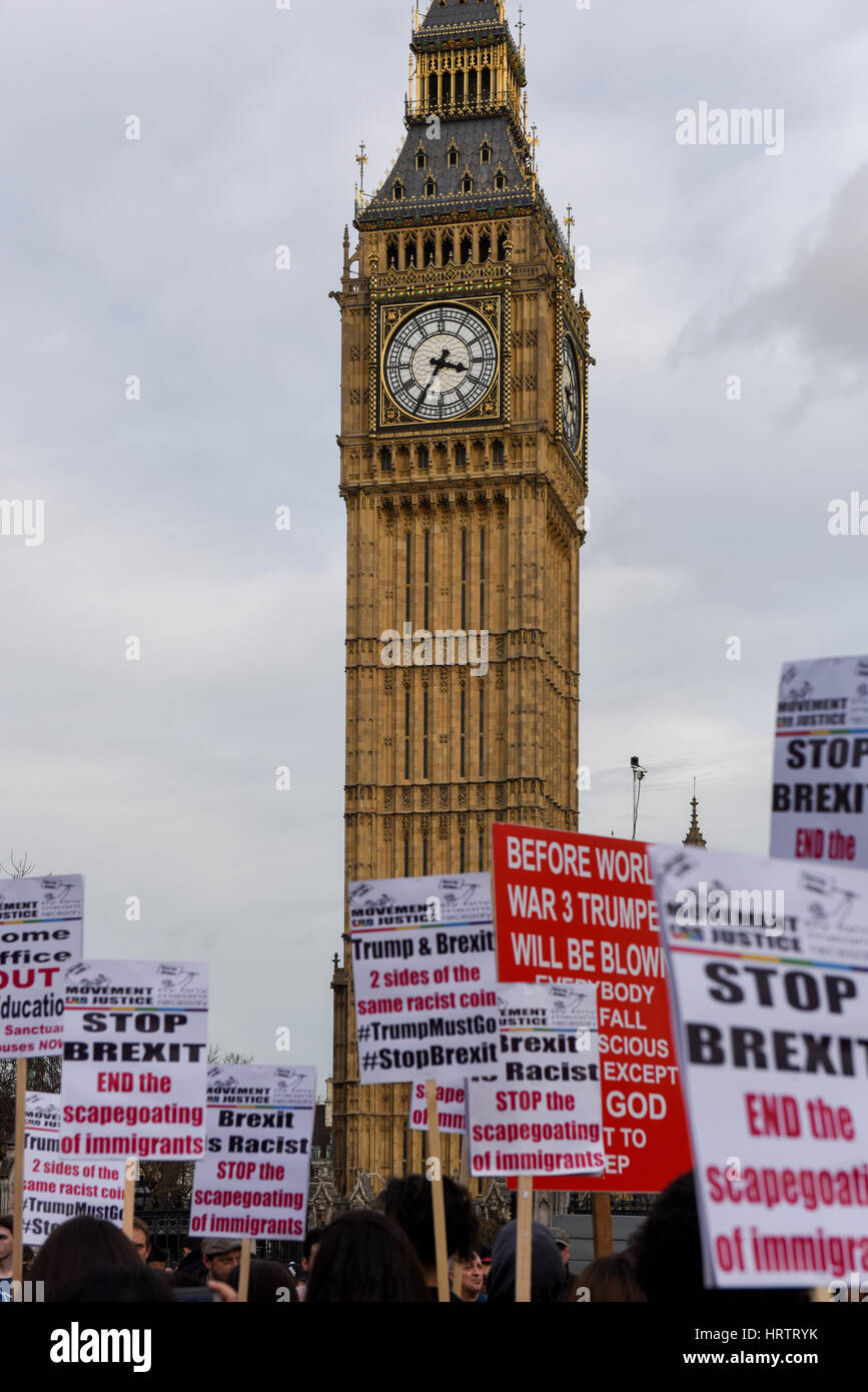 People holding placards in front of Big Ben during the Stop Trump ...